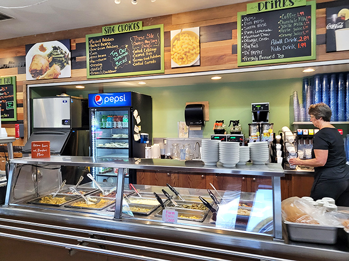 Where food meets function: the serving line offers a glimpse into the day's offerings, each steam tray promising a different homestyle delight.