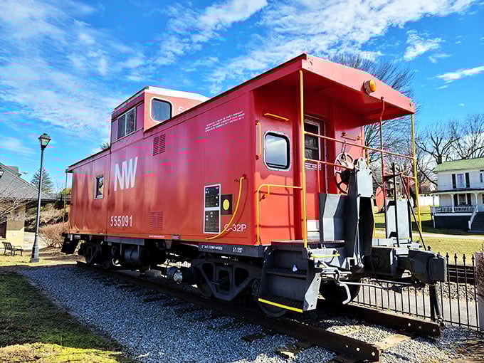 This vintage caboose sits like a retired storyteller, full of tales from the golden age of rail.
