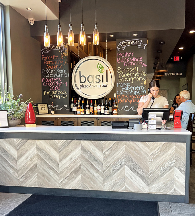 Behind the stylish bar, chalkboard specials and pendant lighting create the perfect backdrop for your "I'll just have one more glass" decisions.