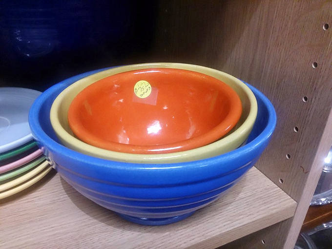 Colorful nesting bowls that would make Marie Kondo spark with joy. These ceramic beauties are waiting to brighten someone's kitchen shelves.