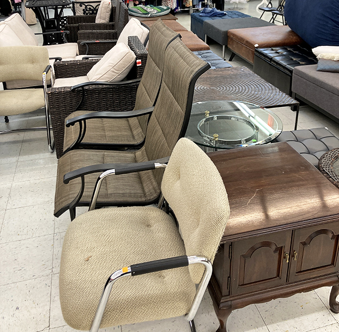 Patio furniture patiently waiting for its second act on someone's deck, ready to host new summer conversations.