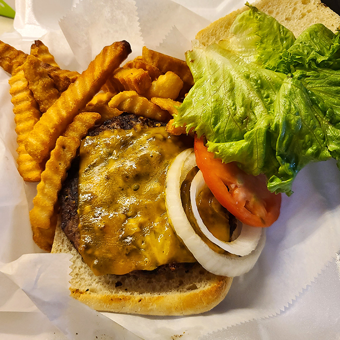 That cheeseburger is giving serious "I belong here too" energy, and honestly, it's not wrong.