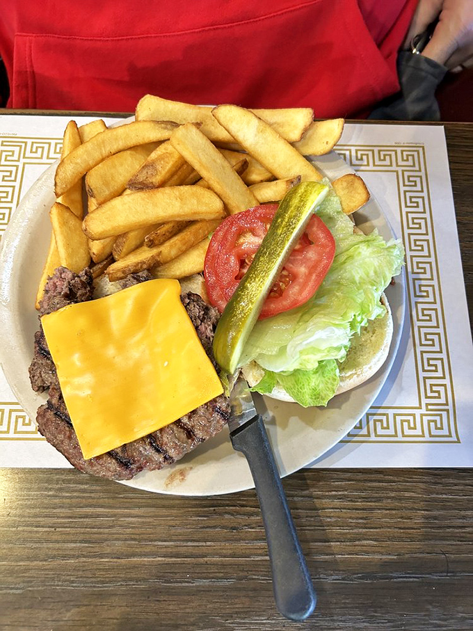 A proper diner cheeseburger with hand-cut fries. No tweezers were used in the assembly of this American classic, and that's exactly how it should be.