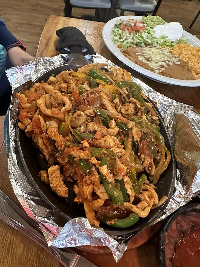 Chicken fajitas that sizzle with such enthusiasm, nearby tables will experience immediate food envy and menu-changing regret.