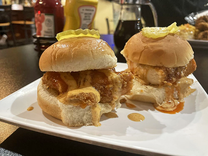 Chicken sliders that prove good things come in small packages. Two bites of pure joy topped with a pickle for that perfect tang.