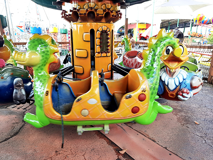 The children's ride section brings carnival charm to the shopping experience&mdash;because nothing says "successful shopping trip" like a spin on a dragon.