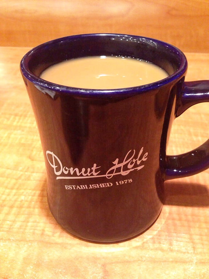 The navy blue mug says it all&mdash;this isn't just coffee, it's liquid tradition. The kind of brew that makes morning people out of night owls.