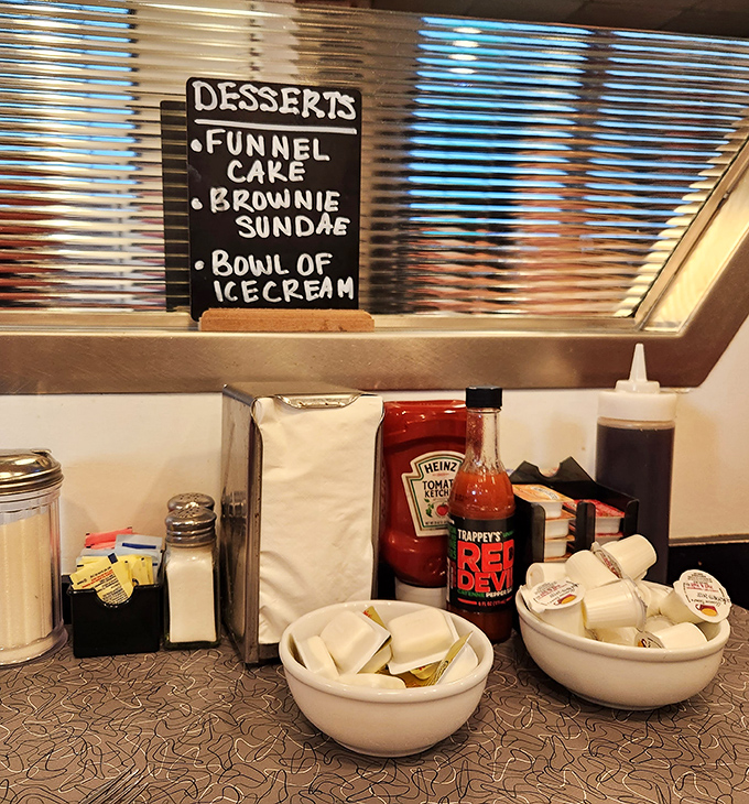 The condiment station&mdash;where ketchup, napkins, and dessert options coexist in perfect harmony. Diners understand that options matter.