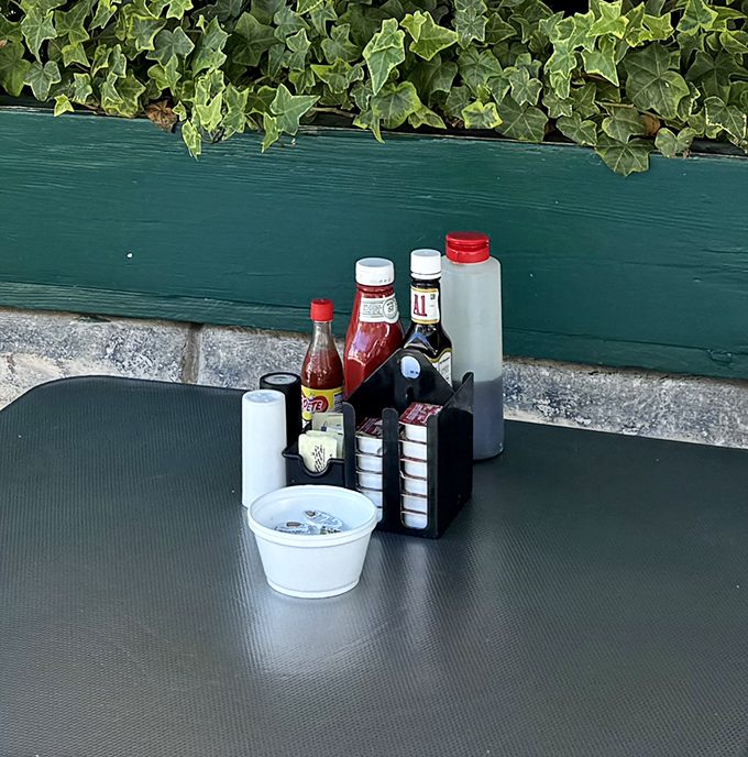 The condiment station &ndash; that sacred altar where hot sauce devotees and ketchup enthusiasts alike can customize their breakfast masterpieces.