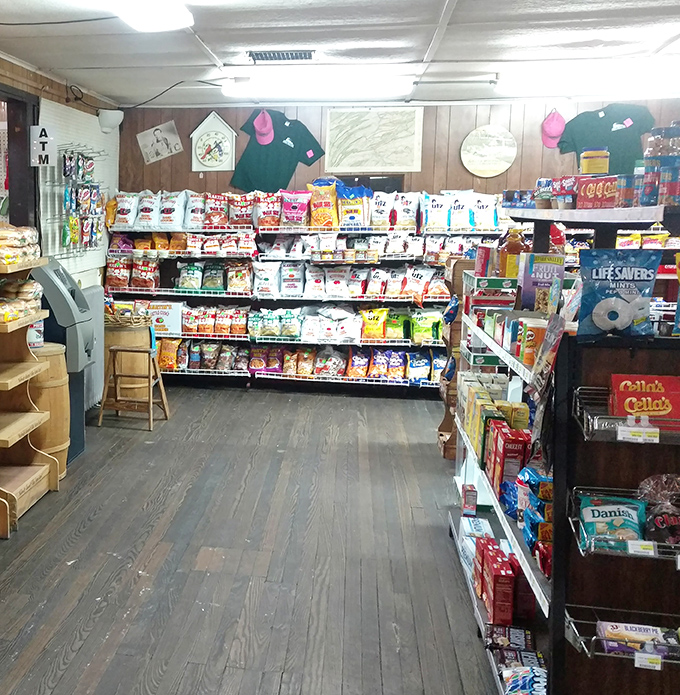 Shelves stocked with life's necessities&mdash;from snacks to staples. The wooden floors have supported generations of hungry shoppers.