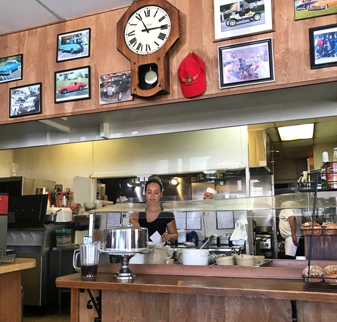 Where breakfast magic happens, complete with pendulum clock keeping time. The open kitchen says, "We've got nothing to hide&mdash;just good food to share."