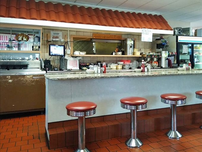 The counter&mdash;where solo diners find community, coffee cups are never empty, and the short-order ballet unfolds before your eyes.