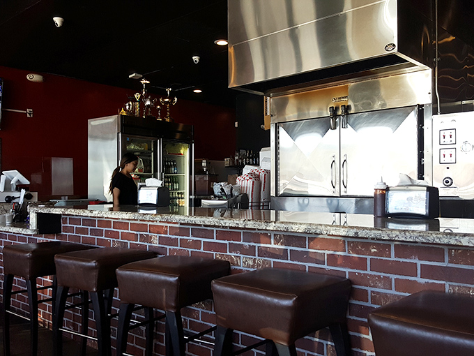 Behind the brick counter, barbecue magic happens. This is the stage where smoke, meat, and time perform their delicious alchemy.