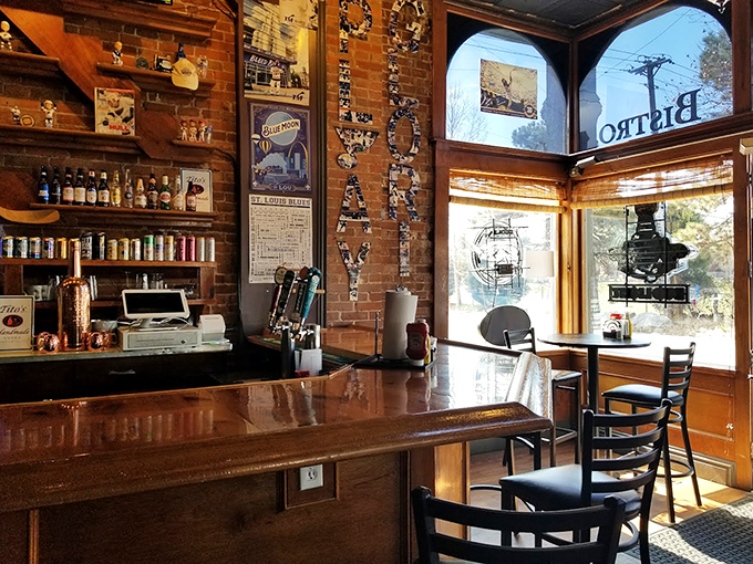Sunlight streams through windows illuminating the classic bar where countless St. Louis stories have been shared over cold beers.