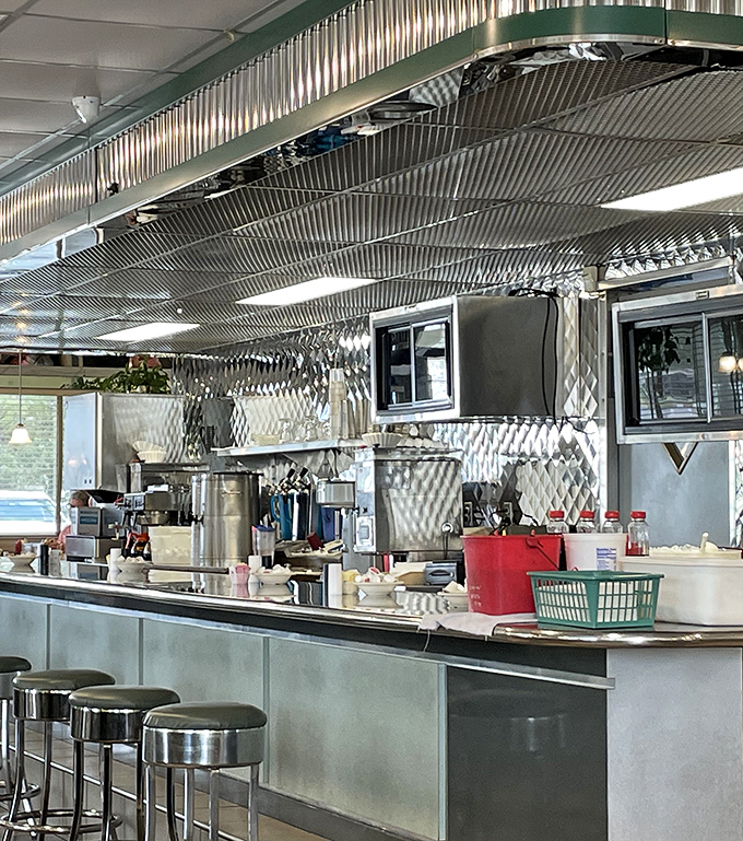 The stainless steel counter and open kitchen&mdash;where breakfast dreams are made real before your eyes. This is dinner theater where eggs and bacon are the stars.