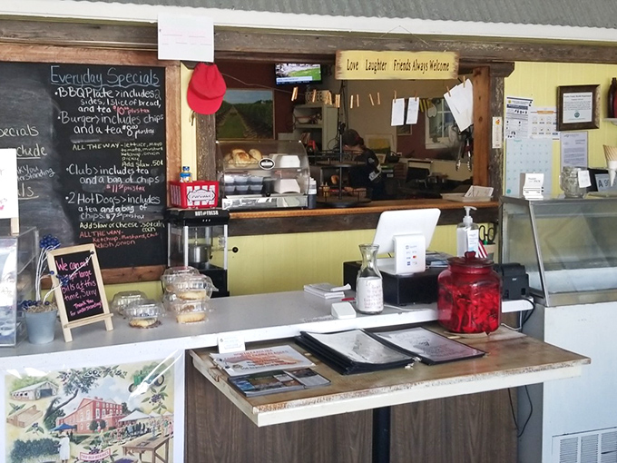 The order counter, where daily specials are scrawled on chalkboards and regulars exchange news while waiting for their comfort food fix.