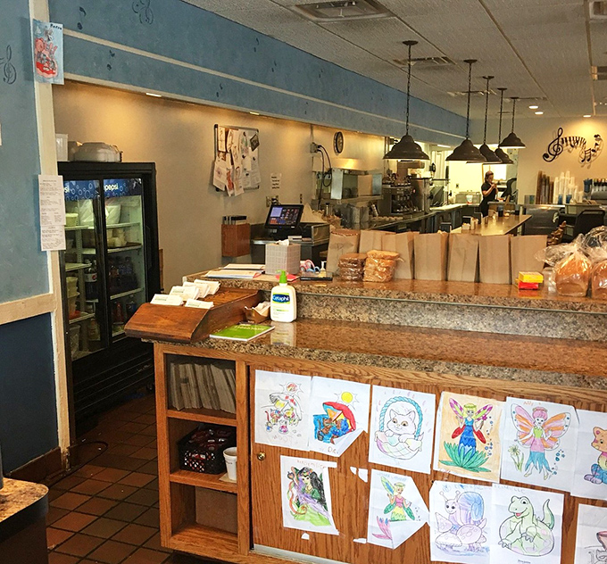 The counter where barbecue dreams come true. Purple accents and neon menus signal that this isn't your grandfather's BBQ joint&mdash;unless your grandfather was extremely cool.