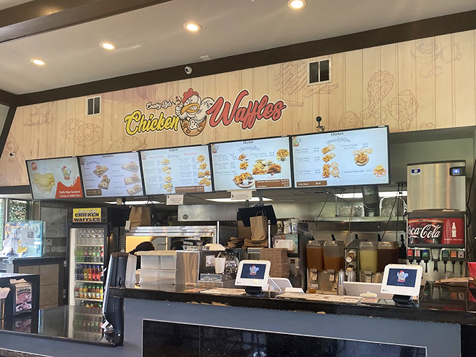 The ordering counter where dreams become reality. Digital menu boards showcase the possibilities while staff prepare your future happiness.