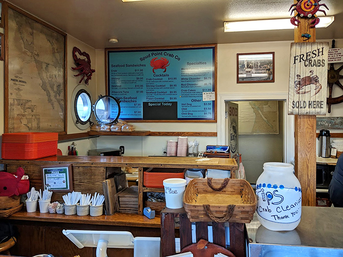 The command center where seafood dreams become reality. Notice the tip jar&mdash;the unsung hero of exceptional service everywhere.