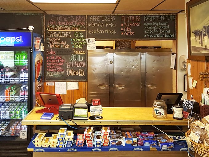The ordering counter—where dreams come true and diets go to die. That chalkboard menu has witnessed more food fantasies than a midnight refrigerator raid.