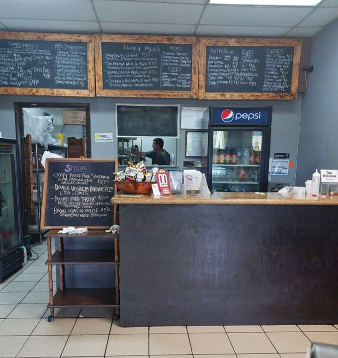The counter where BBQ dreams come true, complete with handwritten specials that change with the pitmaster's inspiration.