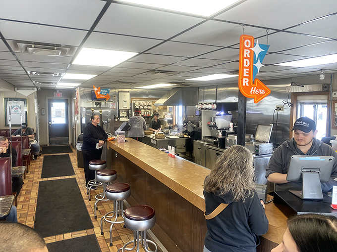 That "Order Here" sign has directed more happy meals than a GPS could ever dream of navigating.