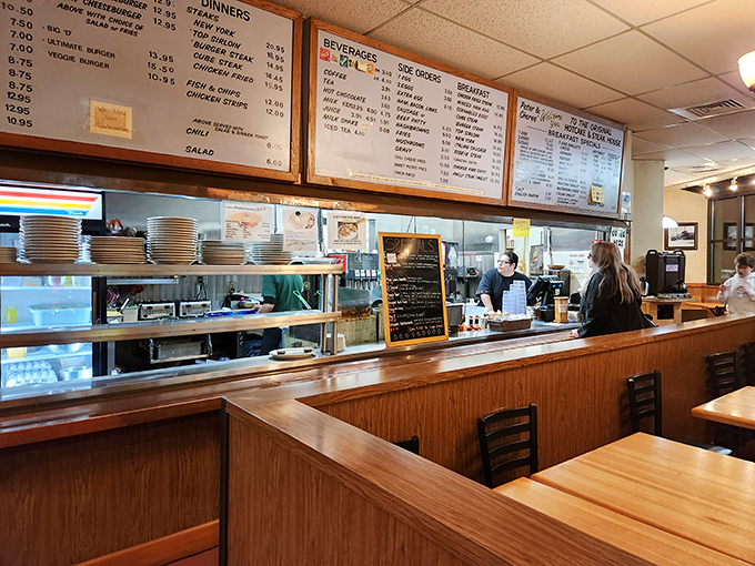 The counter view&mdash;where culinary magic happens before your eyes. Like dinner theater, but with better hashbrowns and no ticket required.