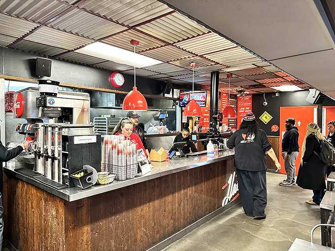 Behind that counter, they're not just taking orders&mdash;they're dispensing controlled culinary chaos that's transformed Nashville into a hot chicken pilgrimage site.