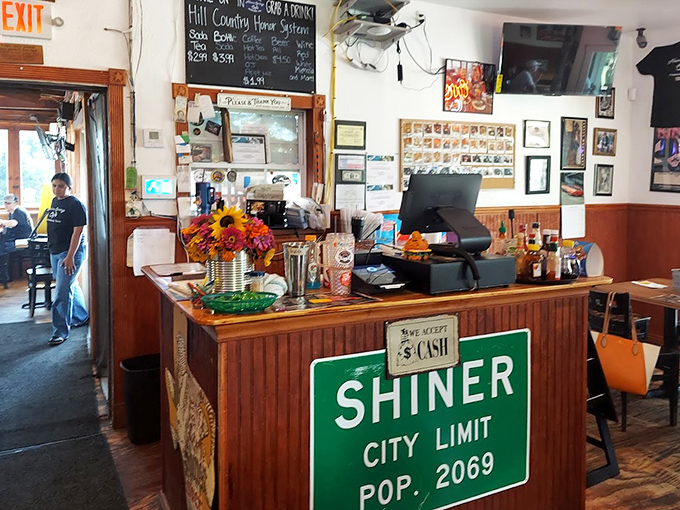 The counter where dreams come true and orders are placed. Notice the sunflowers&mdash;nature's way of saying "Howdy" in the most Texas way possible.