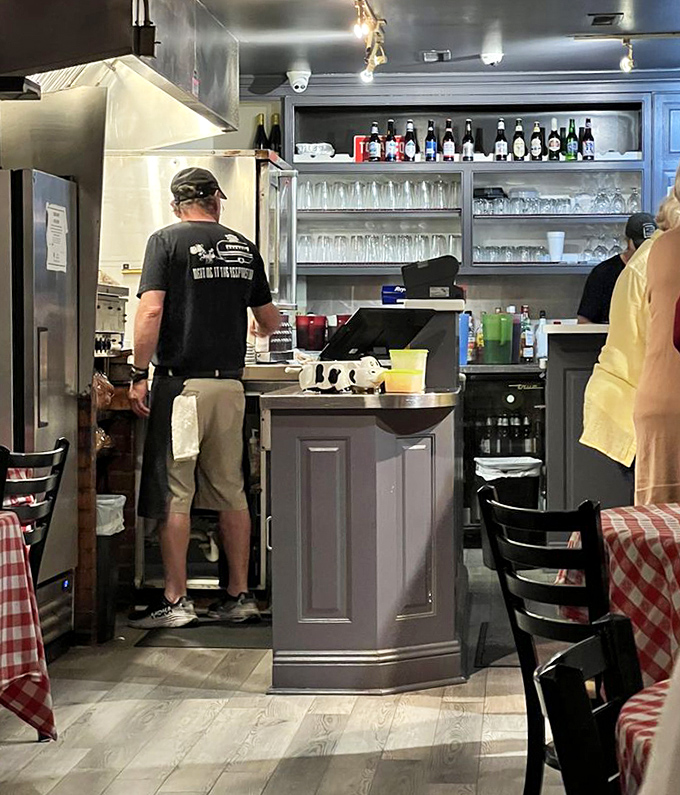 Behind this counter, meat magic happens. The bartenders of beef work their craft with the precision of Swiss watchmakers.