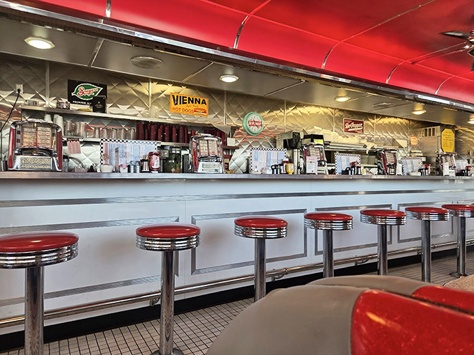 The counter seating offers front-row tickets to the breakfast ballet, where skilled cooks transform simple ingredients into morning masterpieces.