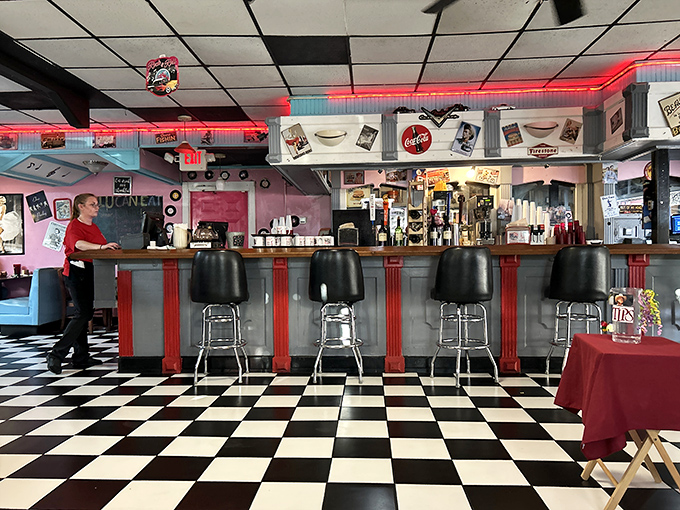 Counter seats: where solo diners become part of the breakfast ballet, watching short-order cooks perform culinary choreography with spatula and grill.