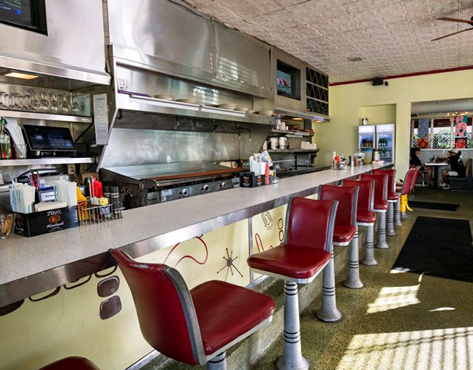The counter&mdash;where solo diners become regulars and the kitchen ballet unfolds before your eyes. Prime seating for both people-watching and plate-watching.