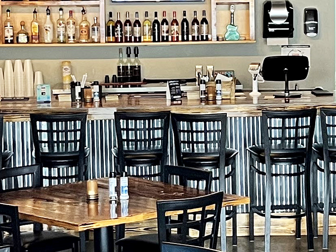 The bar area invites you to perch on a stool, sip something delightful, and contemplate which cut of beef will be the star of your evening.