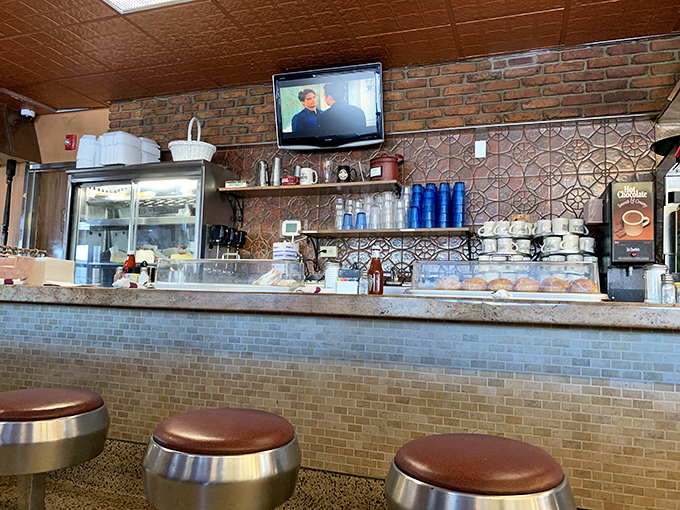Behind the counter magic where coffee appears before you've finished your first cup. The diner sixth sense is real, and it's spectacular.