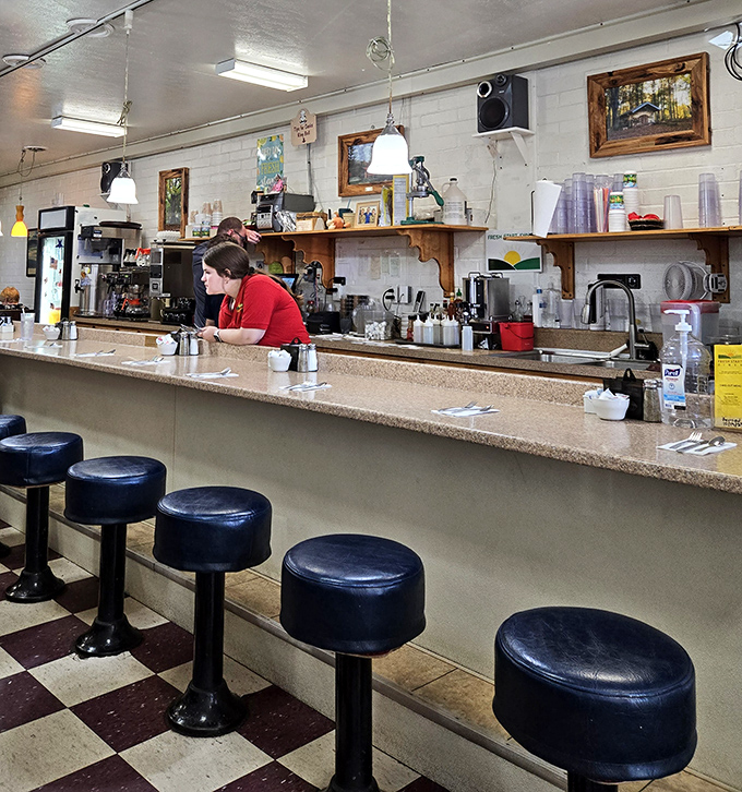 The counter seating—where diner magic happens. It's breakfast theater with the best seats in the house.