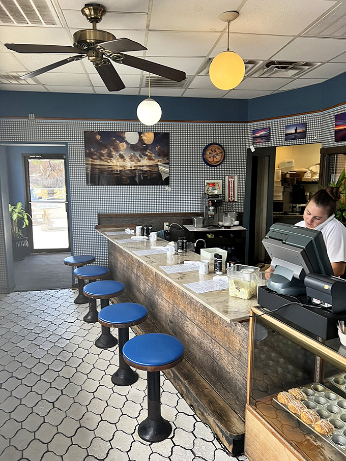 The counter view &ndash; where breakfast theater unfolds and regulars claim their spots like season ticket holders at a championship game.