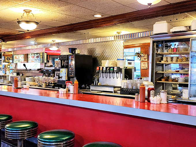 The counter&mdash;where solo diners find community, regulars exchange neighborhood news, and everyone gets a front-row seat to the breakfast ballet.