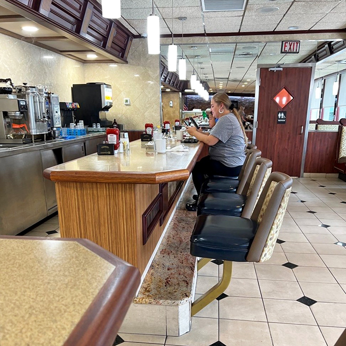 The counter&mdash;where regulars perch like birds on a wire, watching the morning unfold over steaming mugs of coffee.