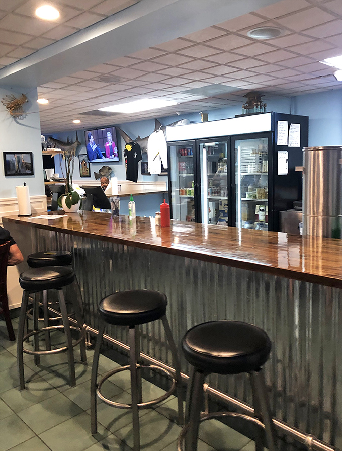 The bar seating offers front-row seats to the kitchen action and prime eavesdropping on fishing tales.