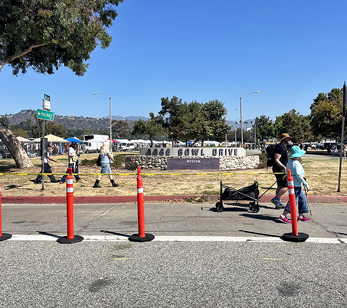 The Rose Bowl Drive entrance sign welcomes bargain hunters armed with shopping carts and comfortable shoes. The thrill of the hunt begins here.