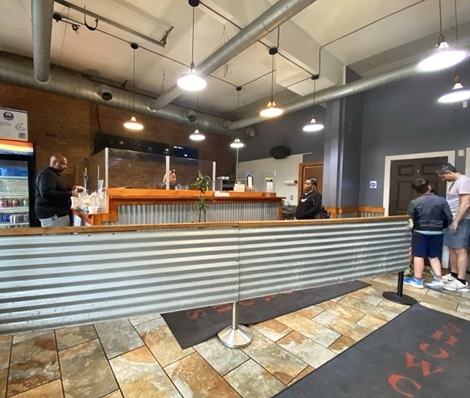 The ordering counter&mdash;where anticipation begins. That corrugated metal and wood combination is Pittsburgh industrial chic at its finest.