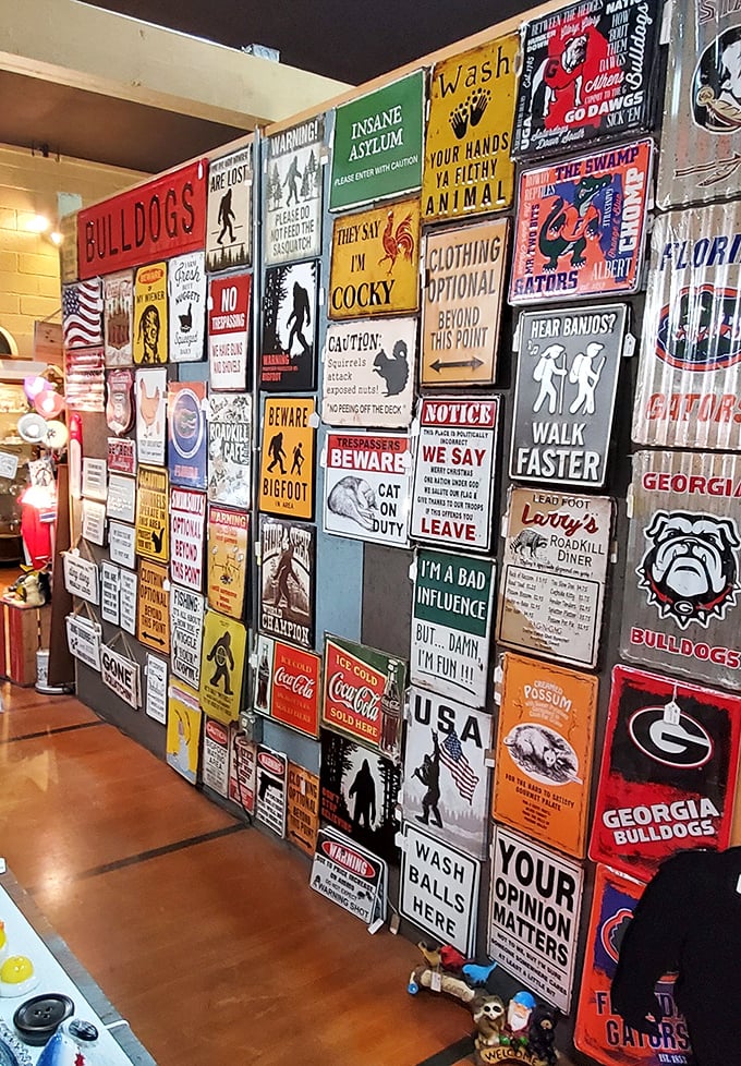 The wall of irreverent signs offers something for everyone's sense of humor. From Bigfoot warnings to "Clothing Optional" notices—personality on display!