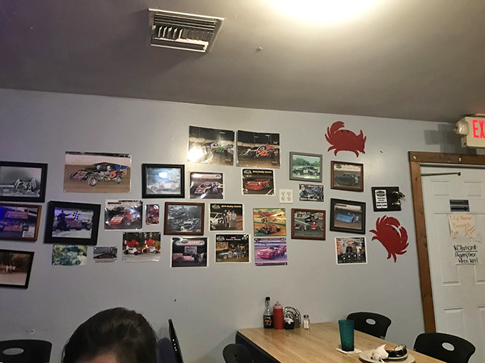 The wall gallery of racing photos and crab decorations tells you everything&mdash;this place values speed in cars but takes its sweet time with seafood.