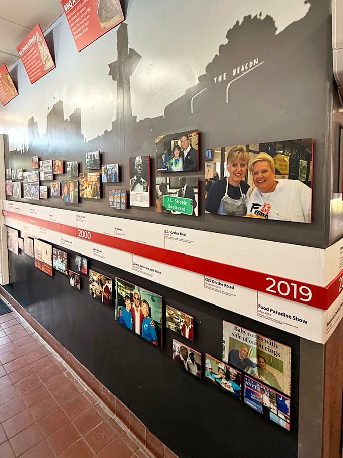 The wall of fame showcases decades of visitors who came hungry and left as members of The Beacon's extended family.