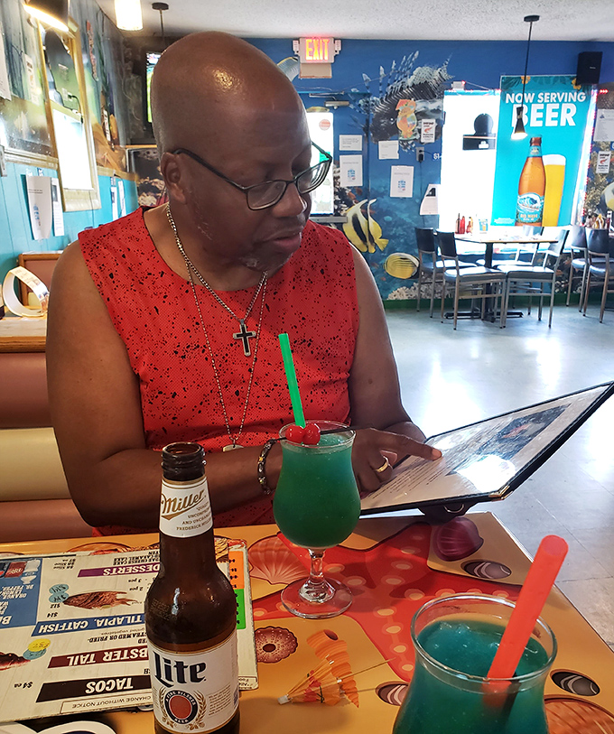 Colorful drinks and good company&mdash;the universal language of a great dining experience. That turquoise cocktail is practically begging to be Instagrammed.