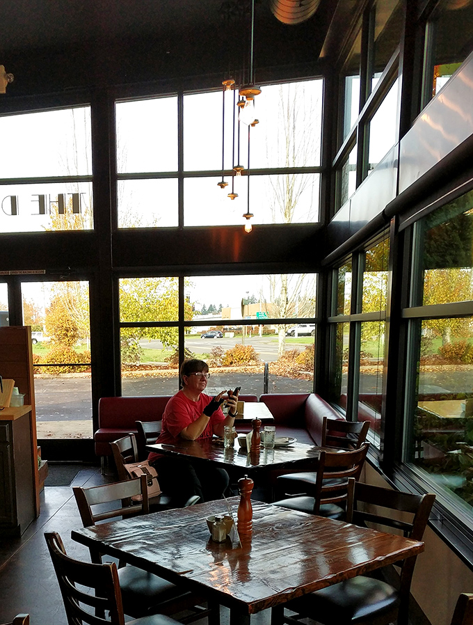 The dining room captures that magical hour when afternoon light makes everything look like it belongs in a Vermeer painting. Even the pepper shaker looks profound.