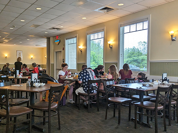 Happy diners in their natural habitat &ndash; notice how nobody's looking at their phones when the food's this good.