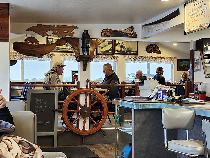 A ship's wheel stands sentinel in the dining room, while wooden whale carvings overhead remind you exactly where your delicious meal originated.