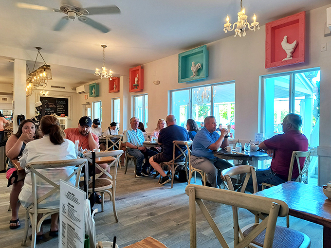 Happy diners sharing stories over steaming plates &ndash; this is what breakfast community looks like in action.